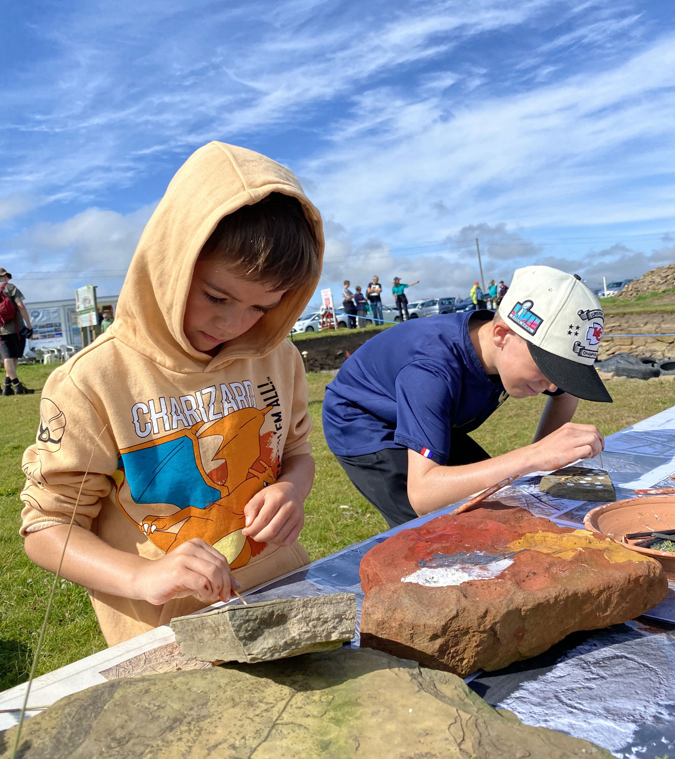 Finan and Logan, from Durham, painting stones. (📷 Jo Bourne) – The Ness ...